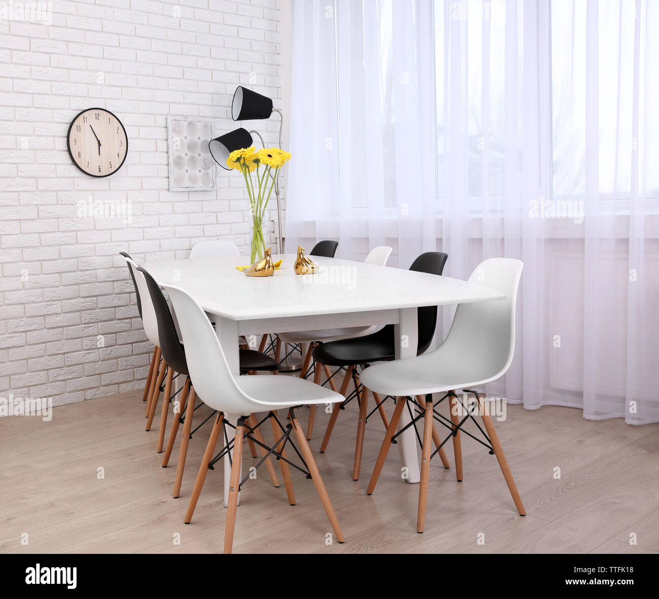 Beautiful interior with table and chairs Stock Photo - Alamy