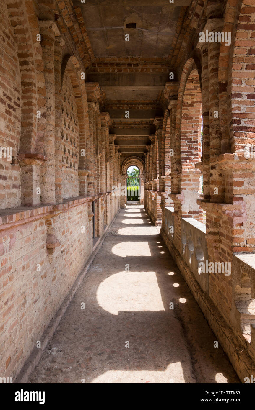 Diminishing perspective of old ruined corridor in Kellie's Castle Stock ...