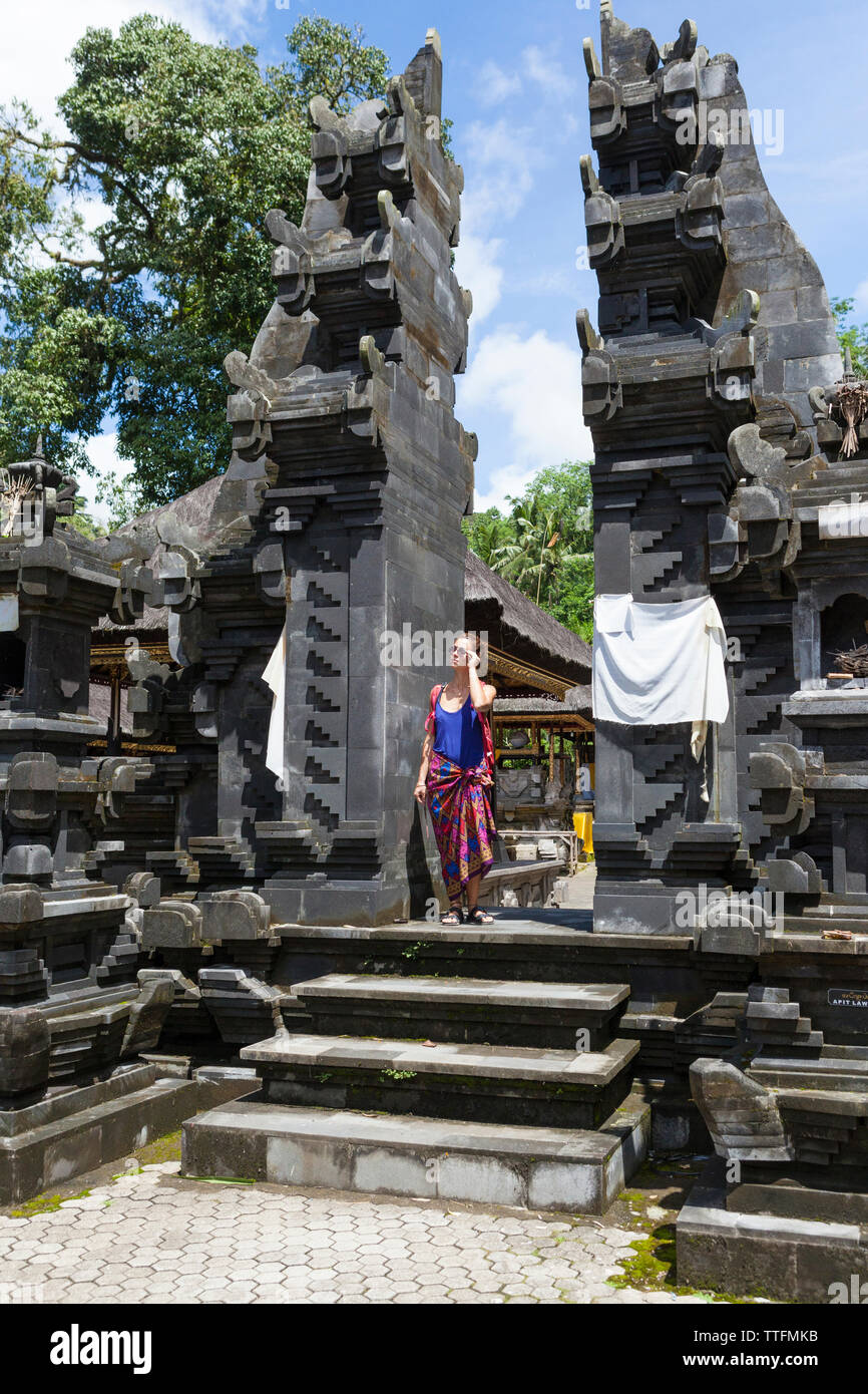 Caucasian tourist girl in a balinese temple, Ubud Bali Stock Photo - Alamy