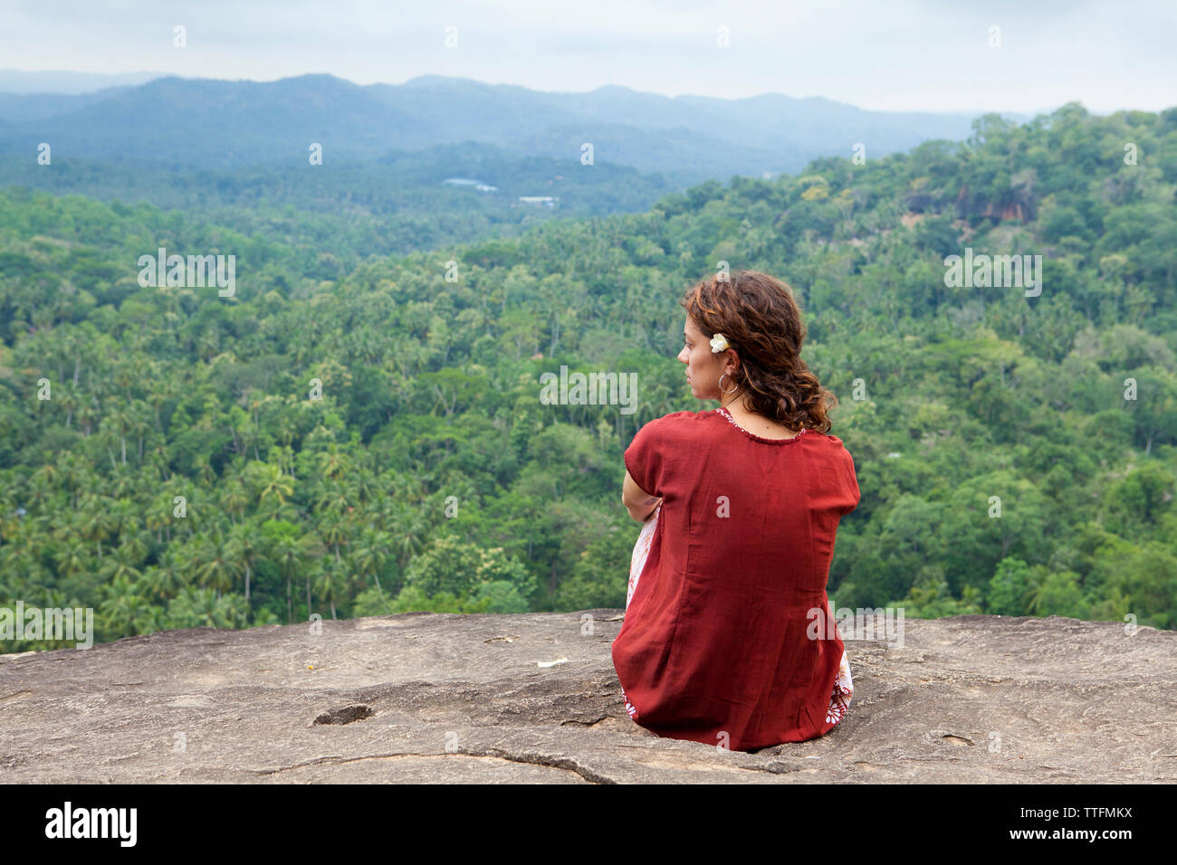 Caucasian tourist girl at high viewpoint with a palm trees, Sri Lanka ...