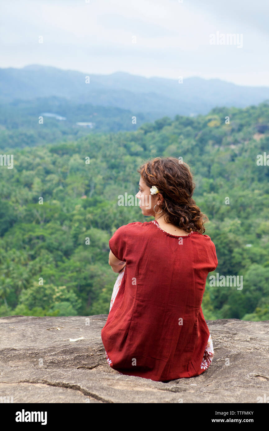 Caucasian tourist girl at high viewpoint with a palm trees, Sri Lanka ...