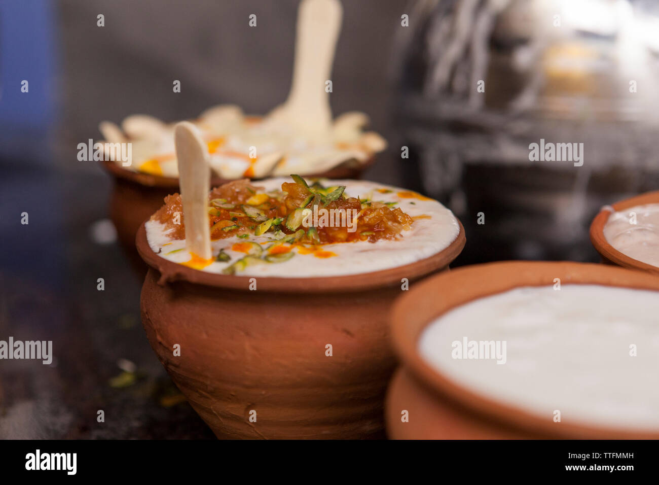 Lassi in clay cups a yogurt-based drink typical from India Stock Photo ...