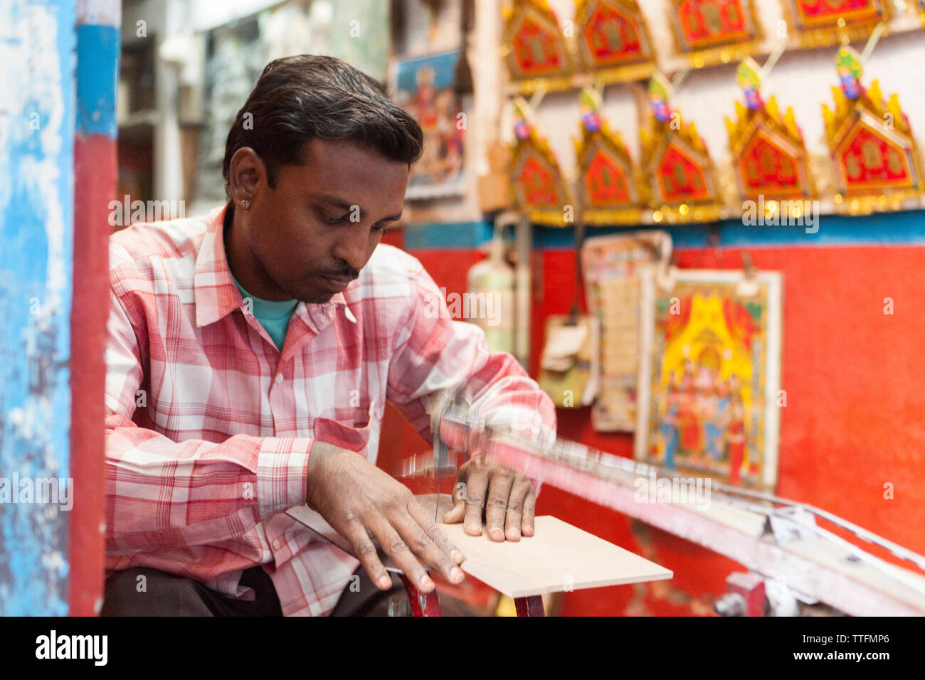 40 years old Indian craftsman working in his laboratory, Jaipur India ...
