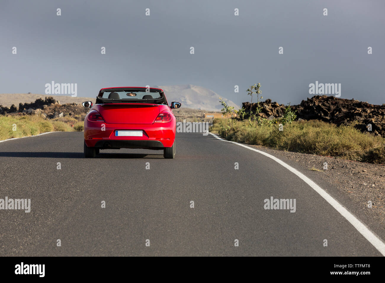 Red car in landscape hi-res stock photography and images - Alamy