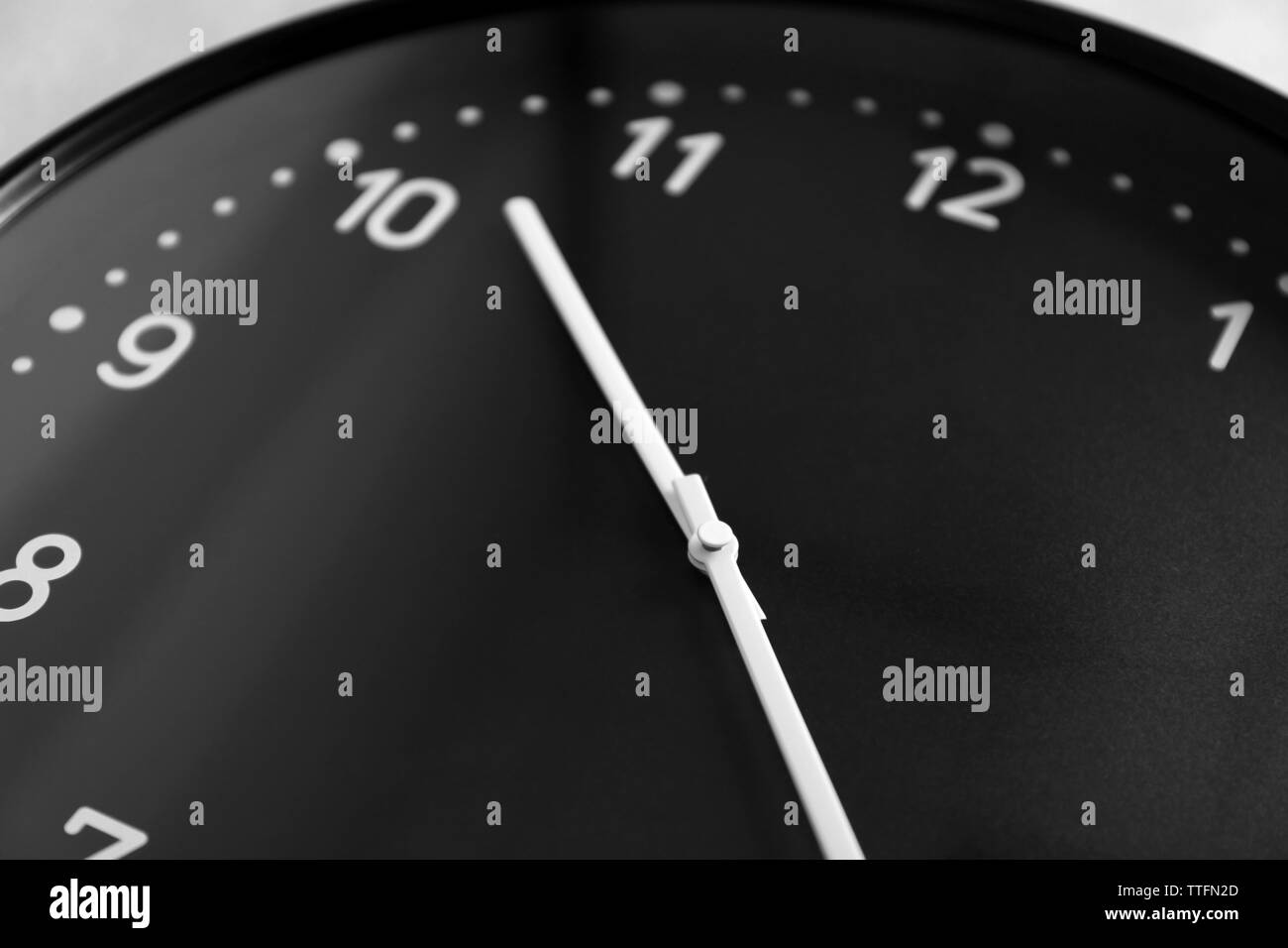 Black simple wall clock watch Black and White Stock Photos & Images - Alamy