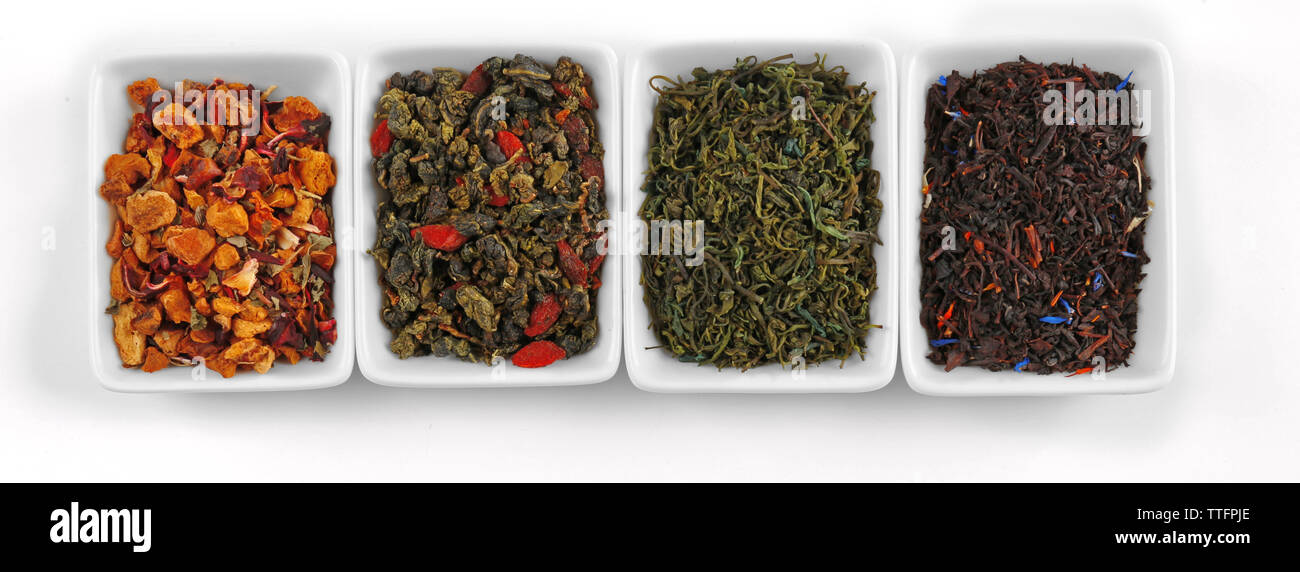 Variety of tea leaves, isolated on white Stock Photo - Alamy
