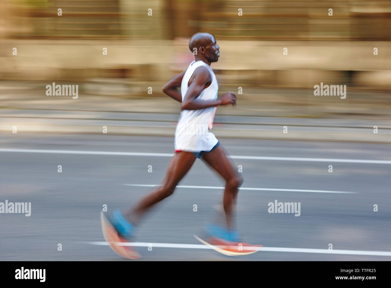Marathon runner in motion on the street. Healthy lifestyle. Exercise ...