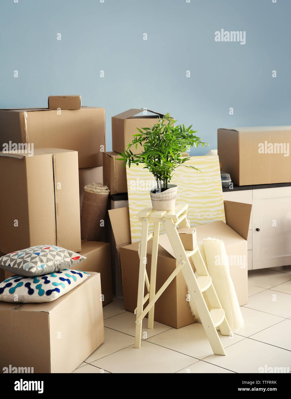 Packed household goods for moving into new house Stock Photo - Alamy