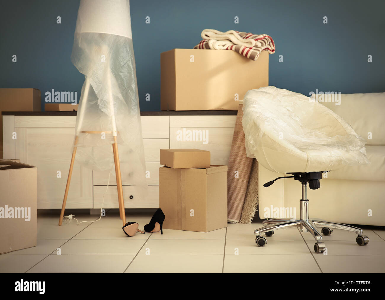 Packed household goods for moving into new house Stock Photo - Alamy