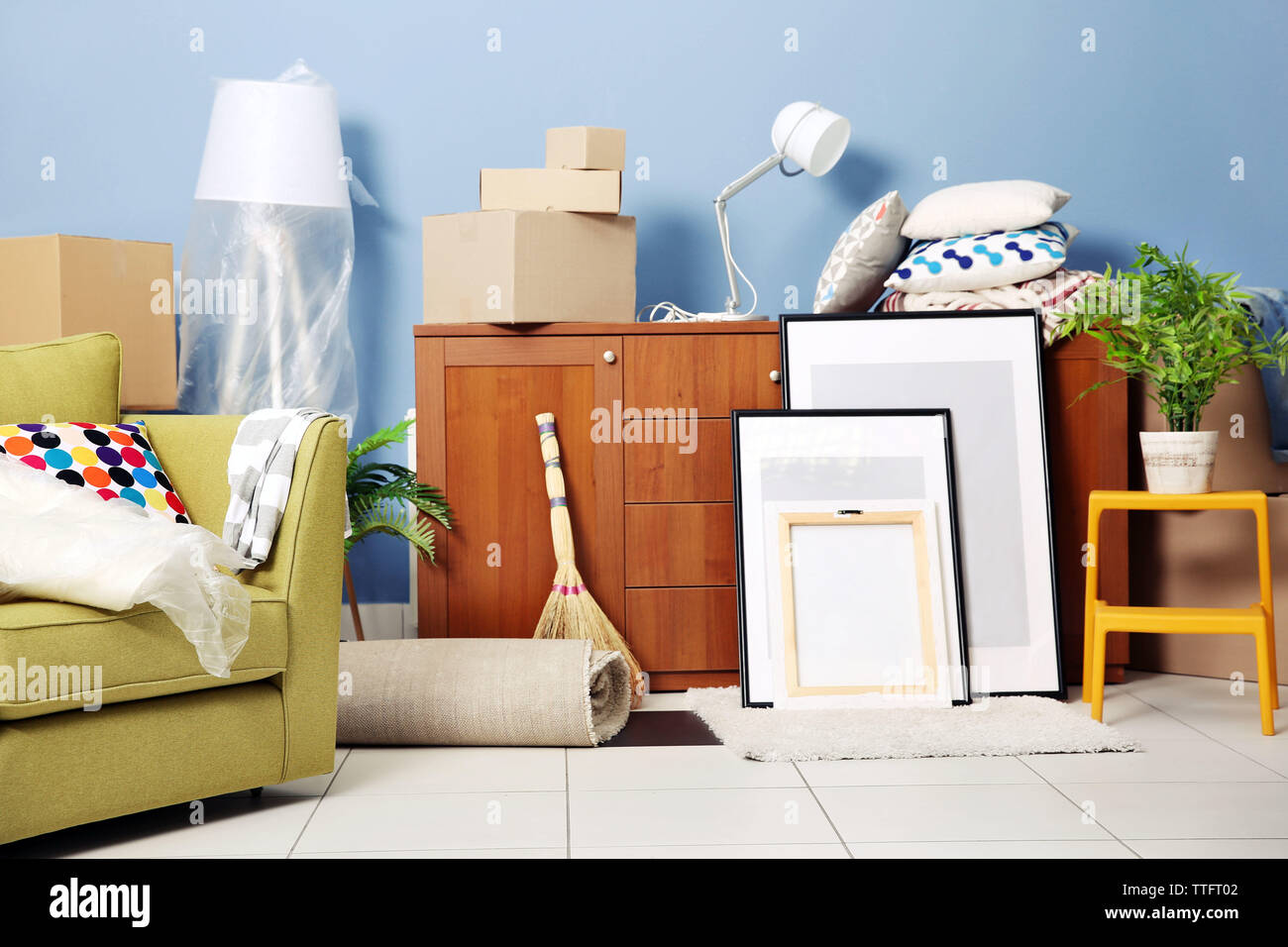 Packed household goods for moving into new house Stock Photo - Alamy