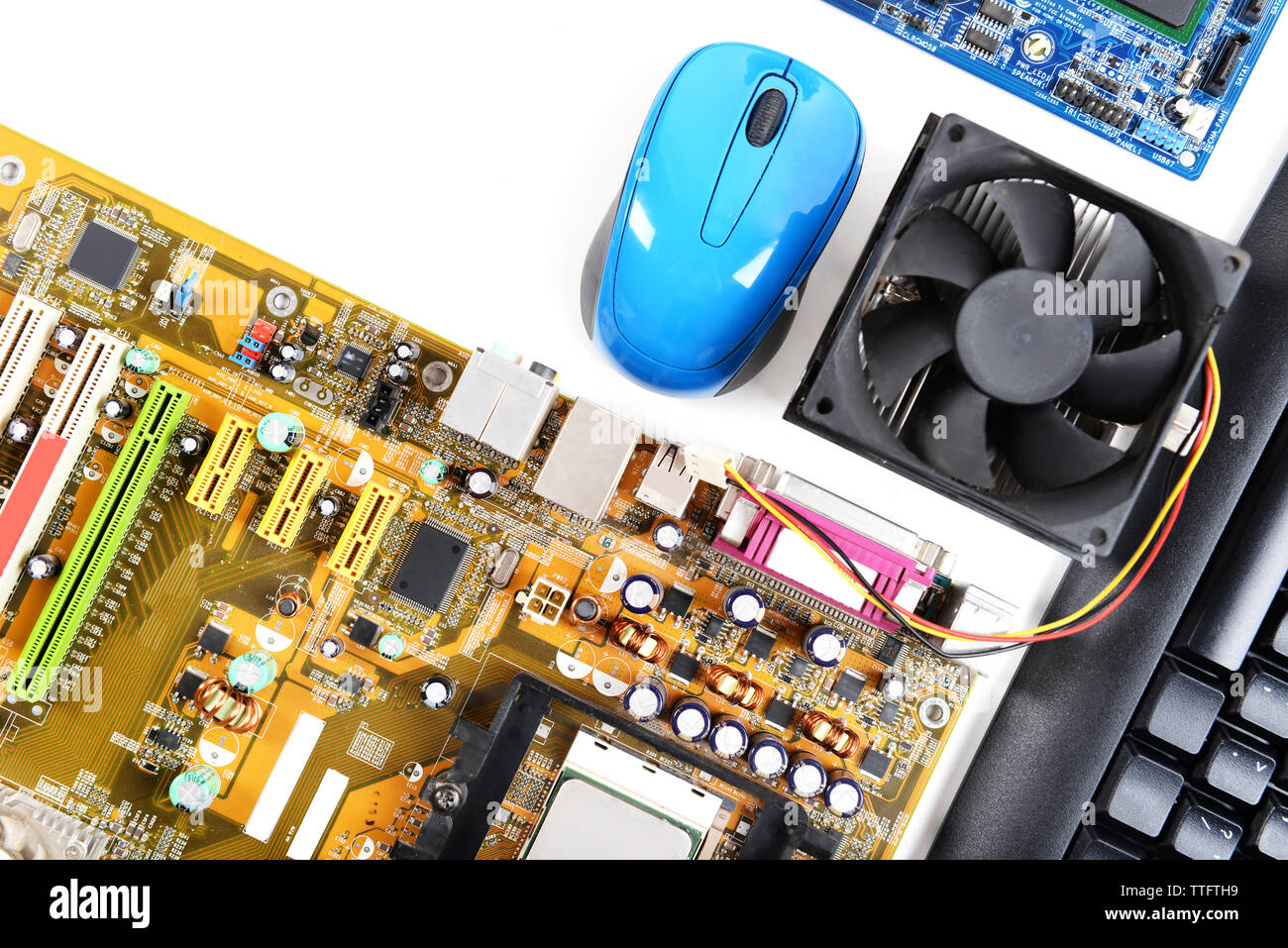 Computer parts with keyboard and mouse on white background Stock Photo ...