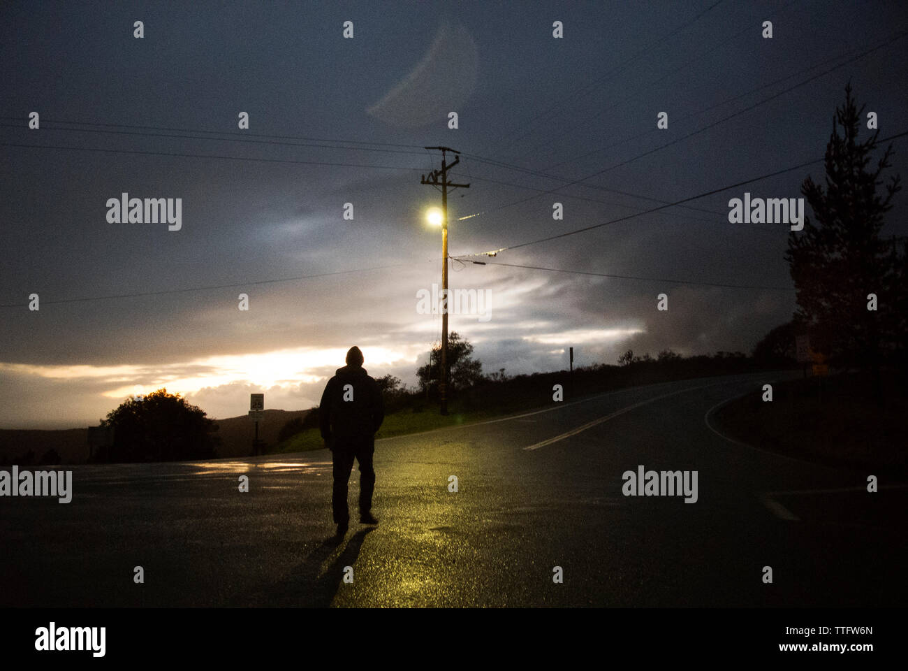 Man standing at crossroads hi-res stock photography and images - Alamy