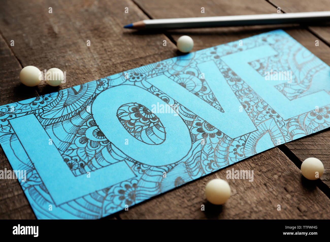 Blue gift card with love doodle drawing on wooden background Stock ...