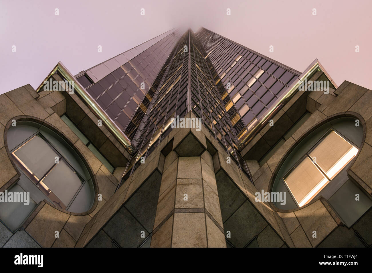 Low angle view of modern office building in city Stock Photo - Alamy
