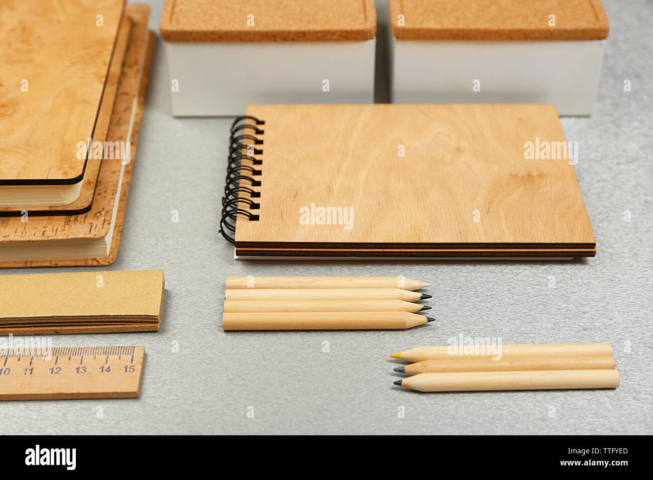 Office set with notebooks and stationery on grey background Stock Photo ...