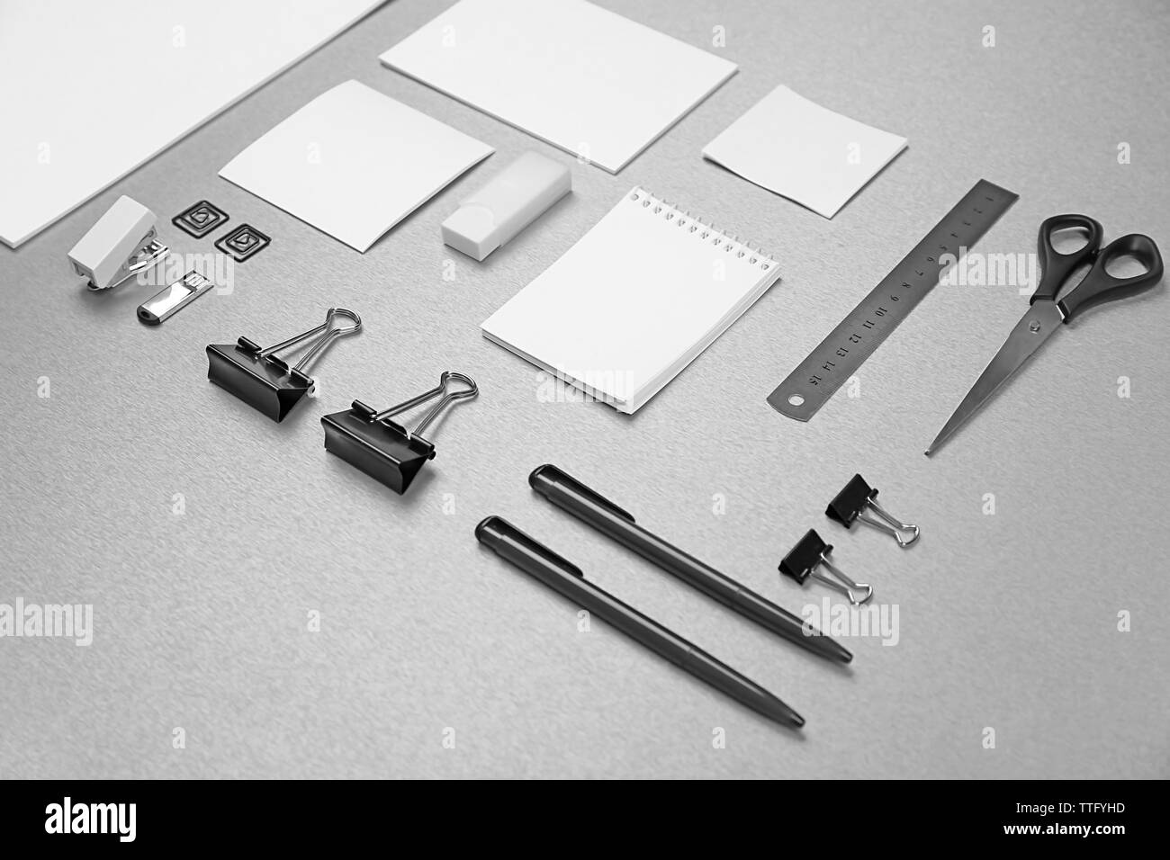 Office set with white sheets of paper, flash drive, notebook and ...