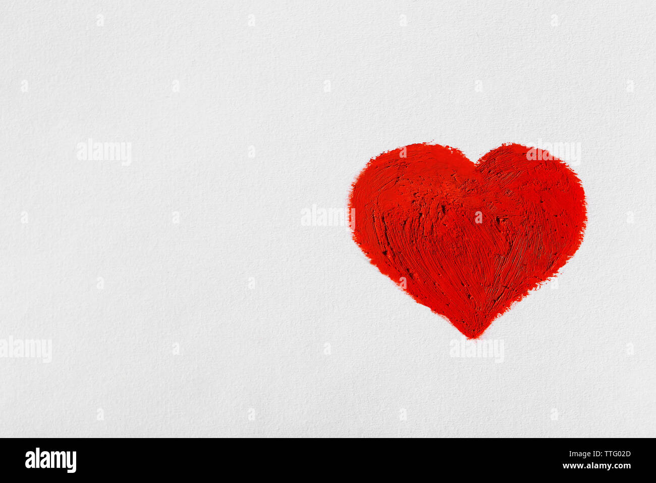 Red heart painted on light background Stock Photo - Alamy