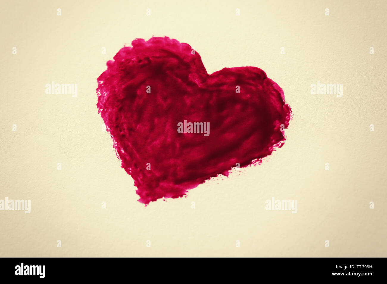 Pink painted colors heart on light background Stock Photo - Alamy