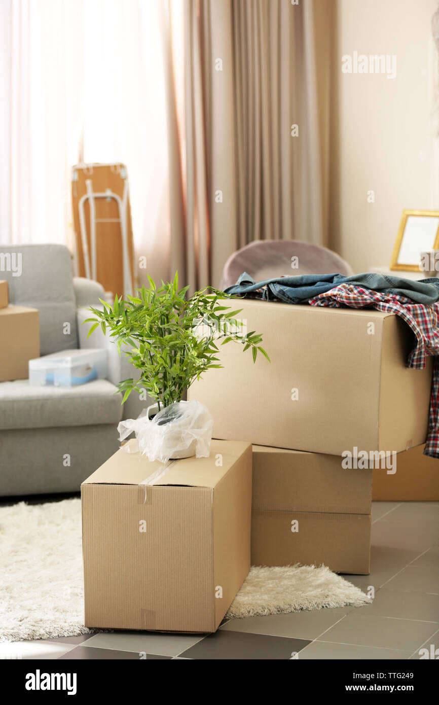 Packed household goods for moving into new house Stock Photo - Alamy