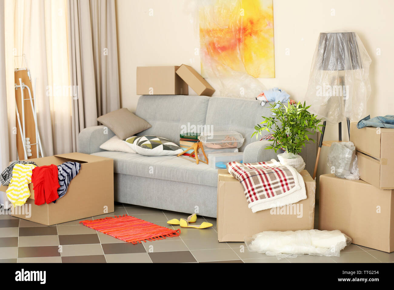 Packed household goods for moving into new house Stock Photo - Alamy