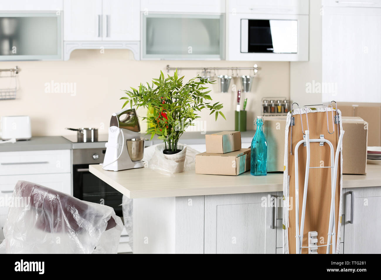Packed household goods for moving into new house Stock Photo - Alamy