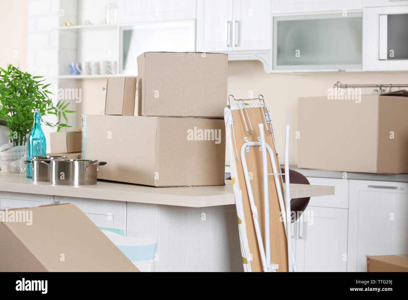 Packed household goods for moving into new house Stock Photo - Alamy