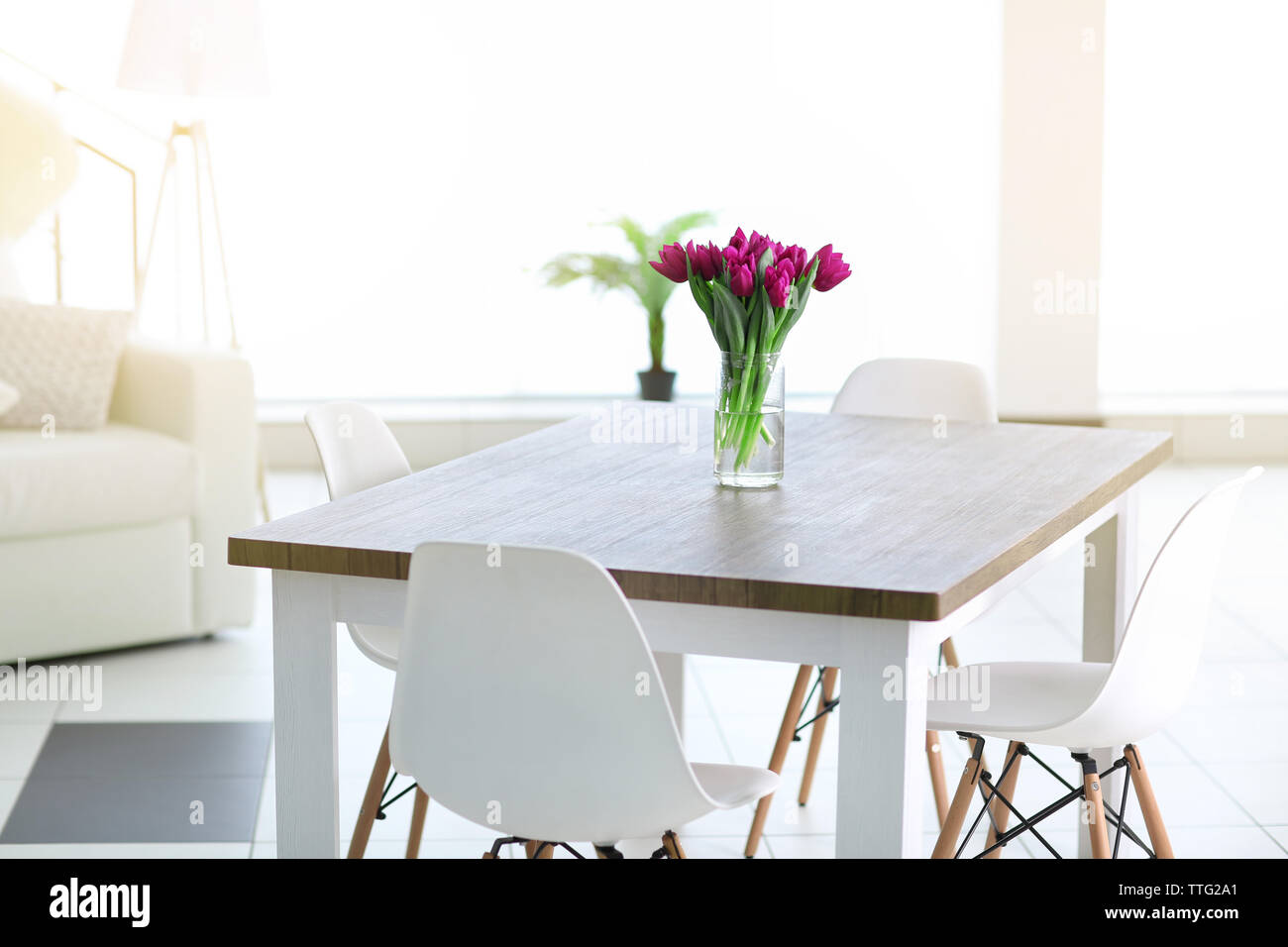 Beautiful comfortable modern interior with table and chairs Stock Photo ...