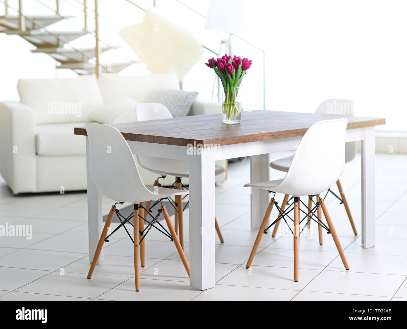 Beautiful comfortable modern interior with table and chairs Stock Photo ...