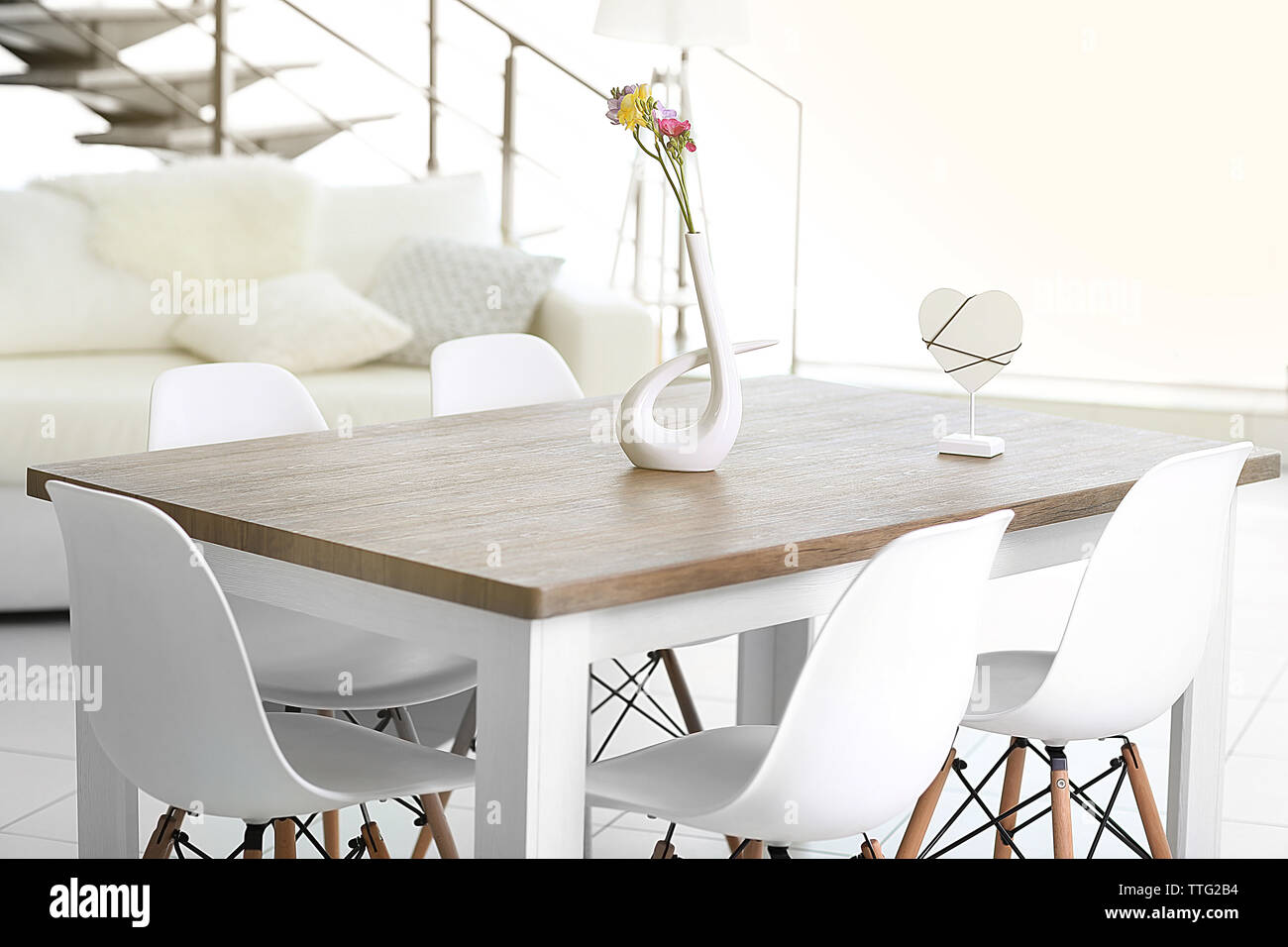 Beautiful comfortable modern interior with table and chairs Stock Photo ...