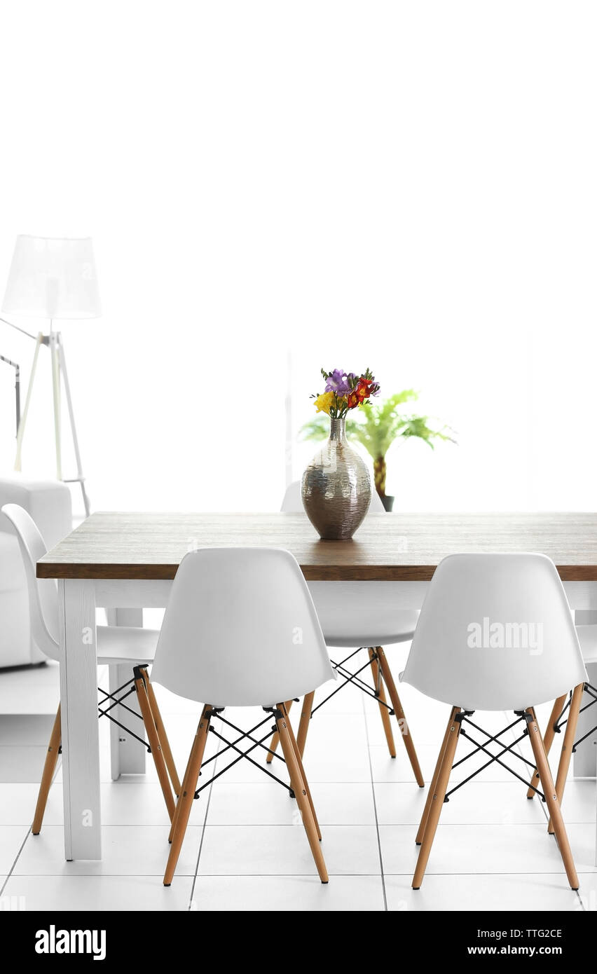 Beautiful comfortable modern interior with table and chairs Stock Photo ...