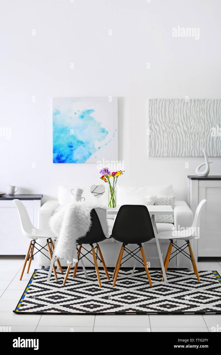 Beautiful comfortable modern interior with table and chairs Stock Photo ...