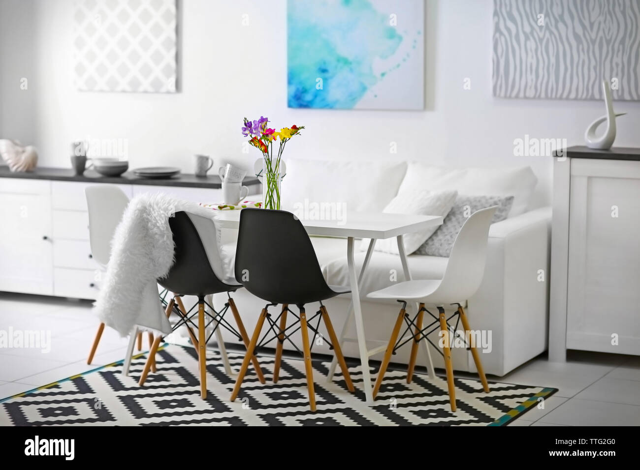 Beautiful comfortable modern interior with table and chairs Stock Photo ...