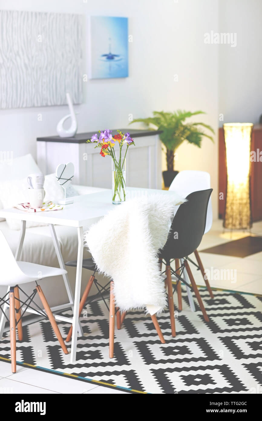 Beautiful comfortable modern interior with table and chairs Stock Photo ...