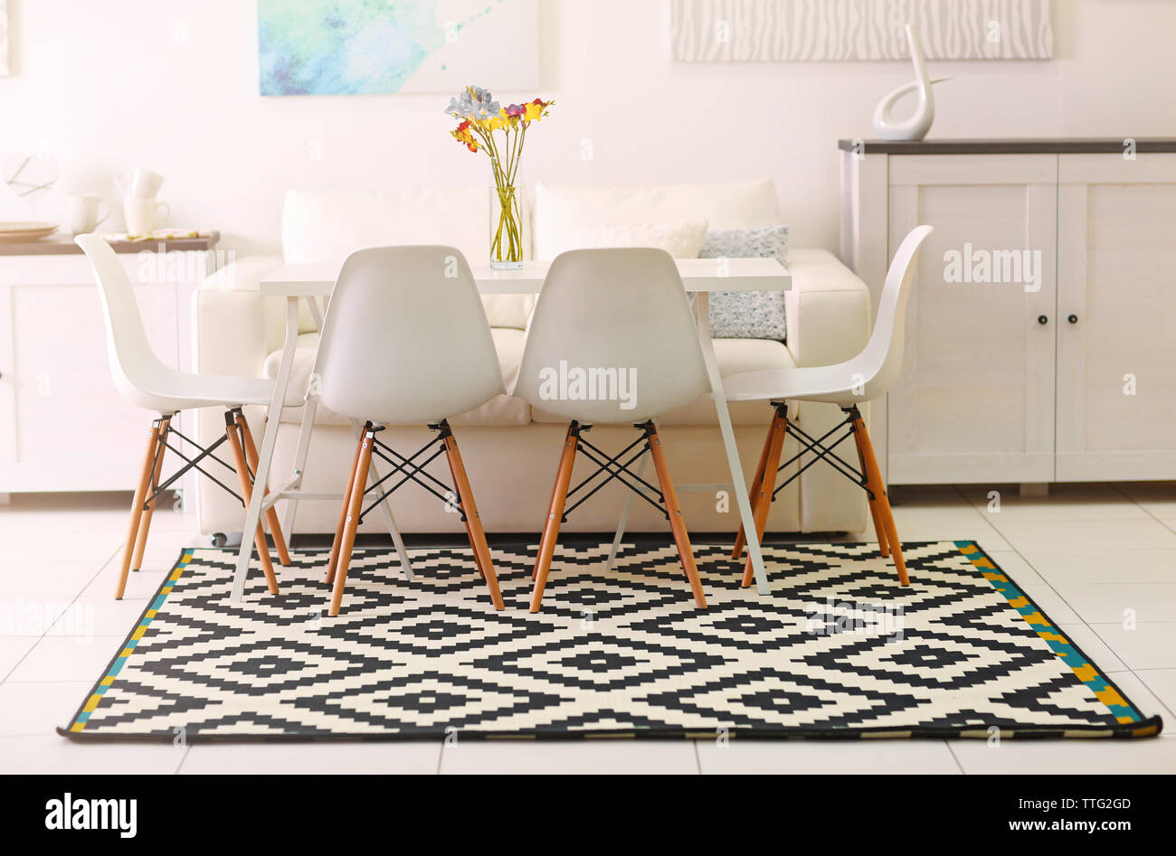 Beautiful comfortable modern interior with table and chairs Stock Photo ...