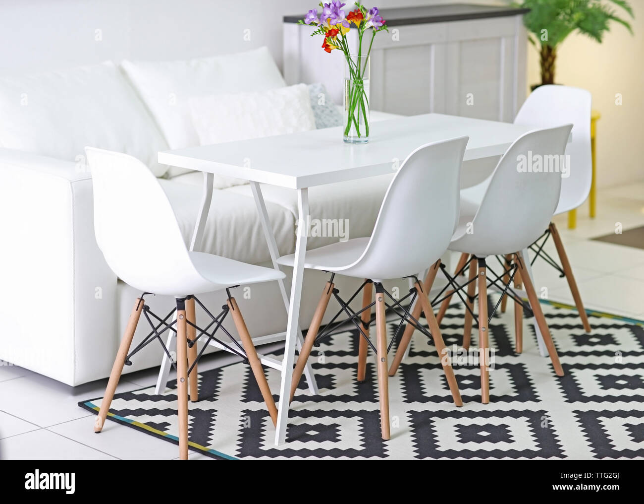 Beautiful comfortable modern interior with table and chairs Stock Photo ...