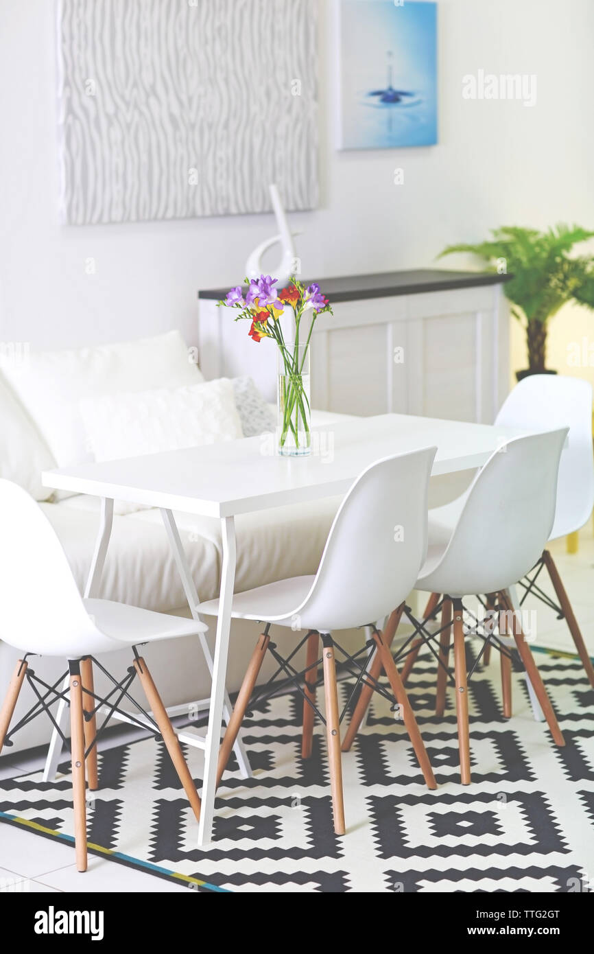 Beautiful comfortable modern interior with table and chairs Stock Photo ...