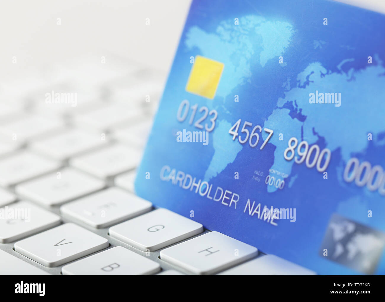Credit card on keyboard, close up Stock Photo - Alamy