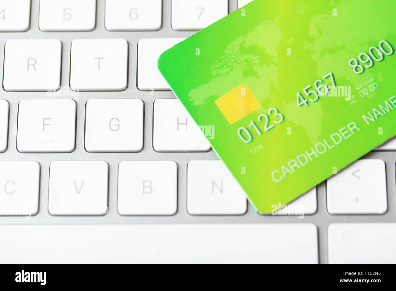 Credit card on keyboard, close up Stock Photo - Alamy