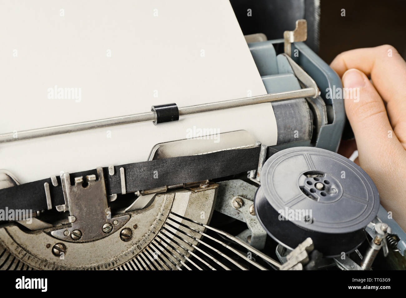 Vintage typewriter human hand hi-res stock photography and images - Alamy