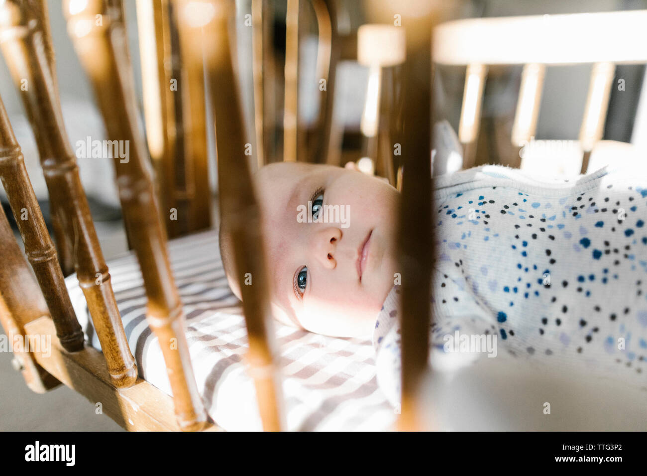 Wooden baby crib hi-res stock photography and images - Alamy