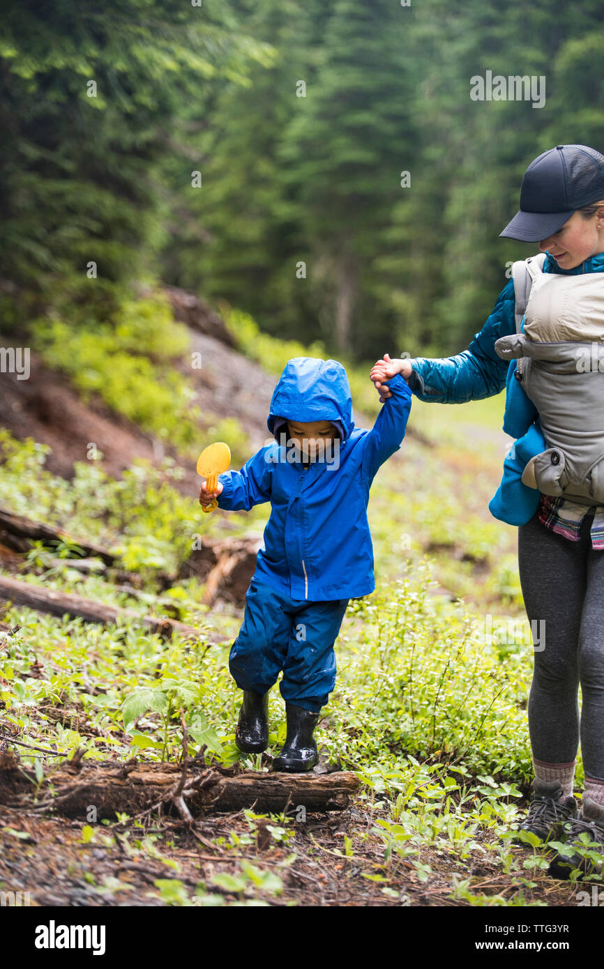 Children balancing on a log hi-res stock photography and images - Alamy