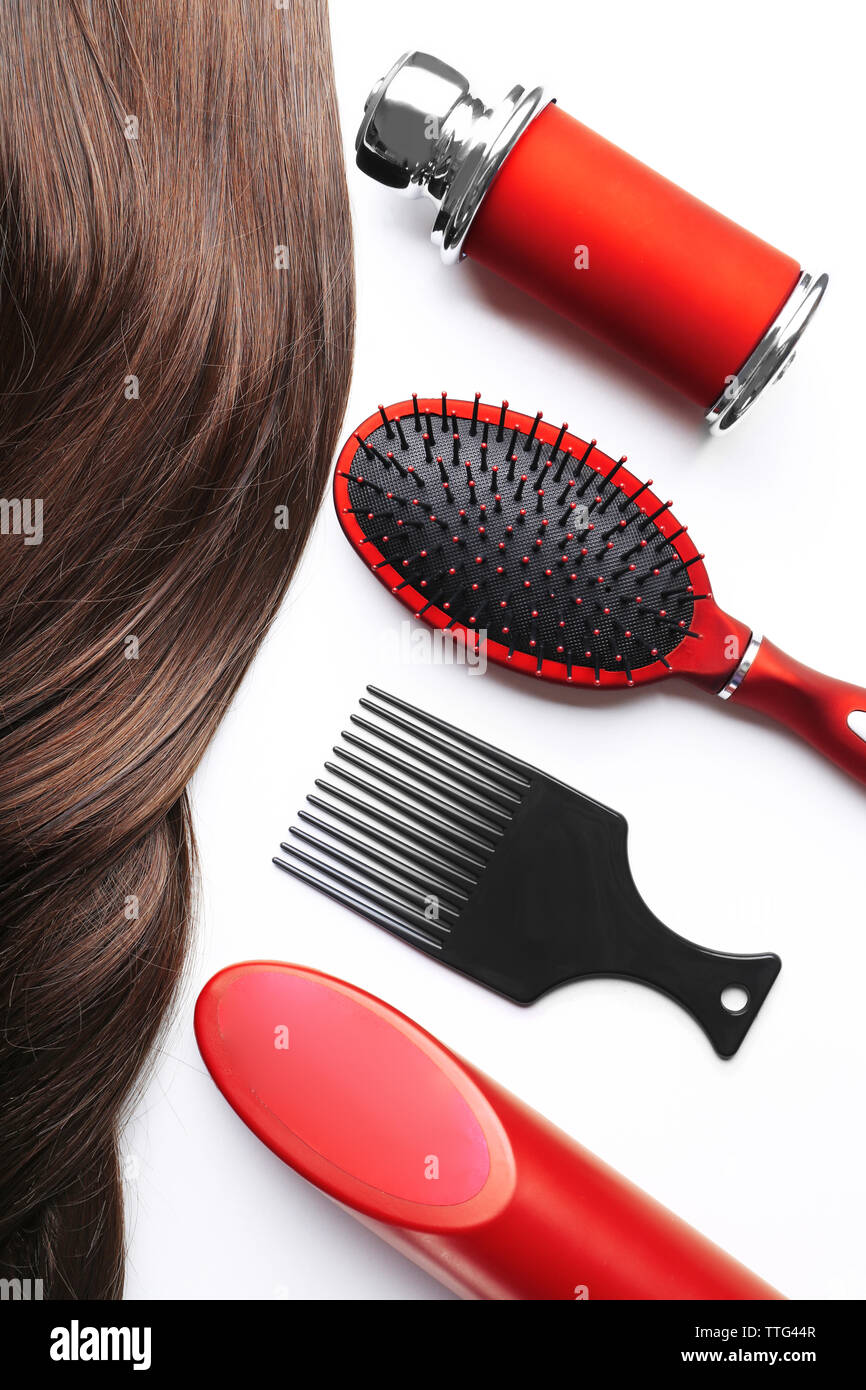 Barber set with strand of hair, tools and cosmetics, isolated on white ...