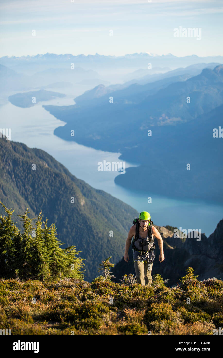 Climber approaches the summit of Douglas Peak, British Columbia Stock ...