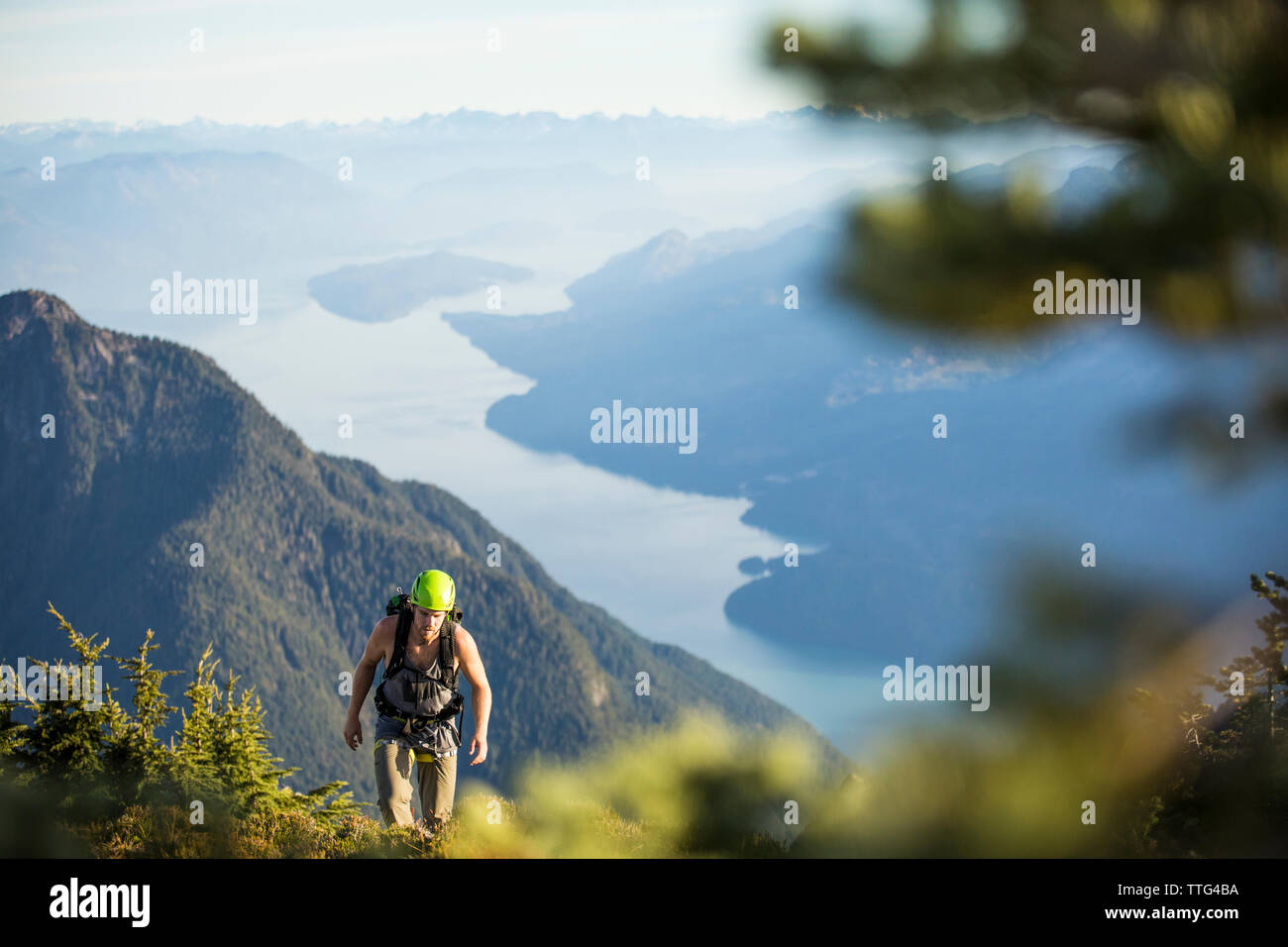 Climber approaches the summit of Douglas Peak, British Columbia Stock ...