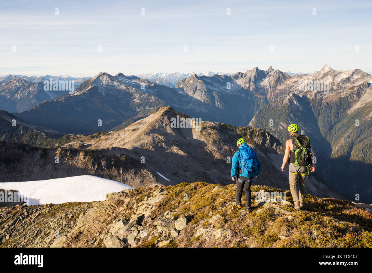 Backpackers hiking along high mountain ridge, B.C Stock Photo - Alamy