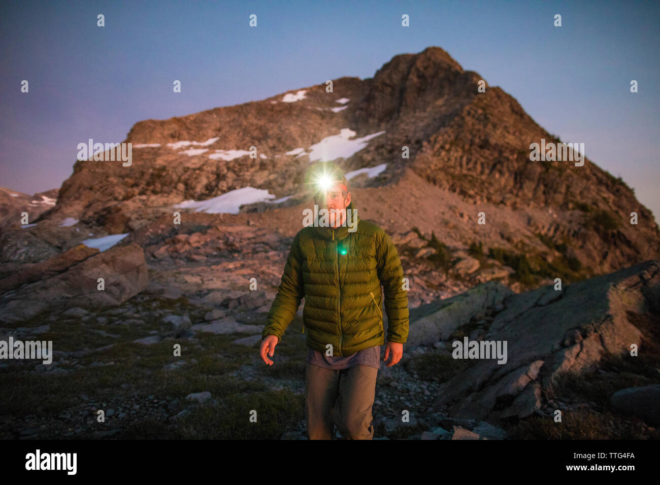 Man wearing headlamp hi-res stock photography and images - Alamy