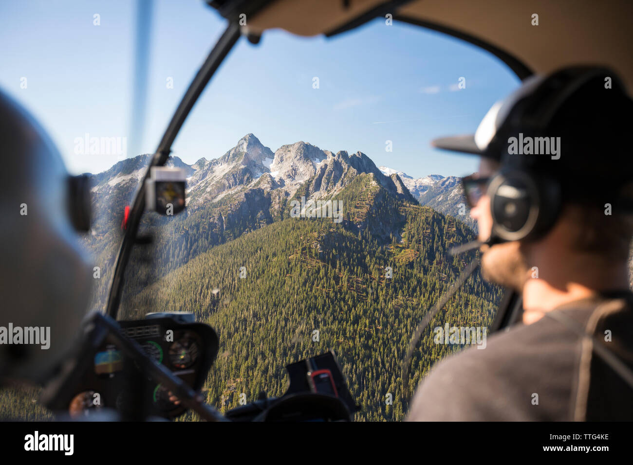 Aerial view of the Coast Mountain Range from inside a helicopter Stock ...