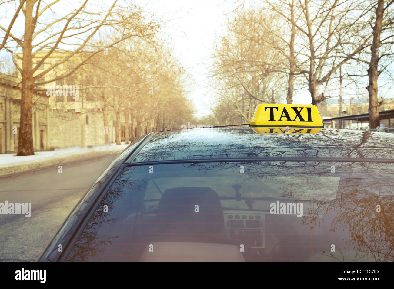 Taxi car with sign, outdoor Stock Photo - Alamy