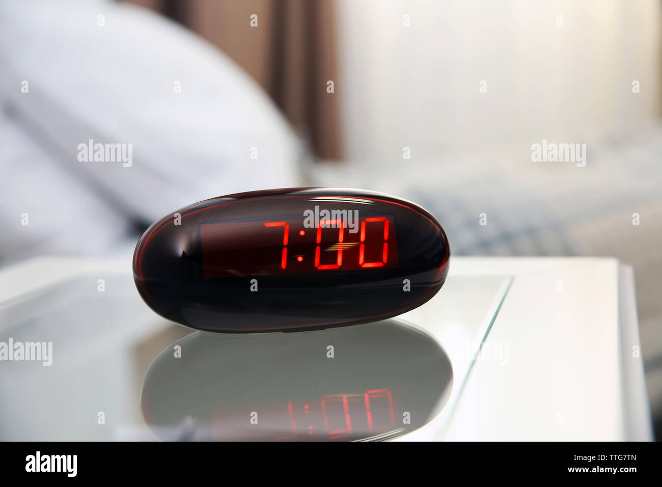 Digital alarm clock by bedside night hi-res stock photography and ...