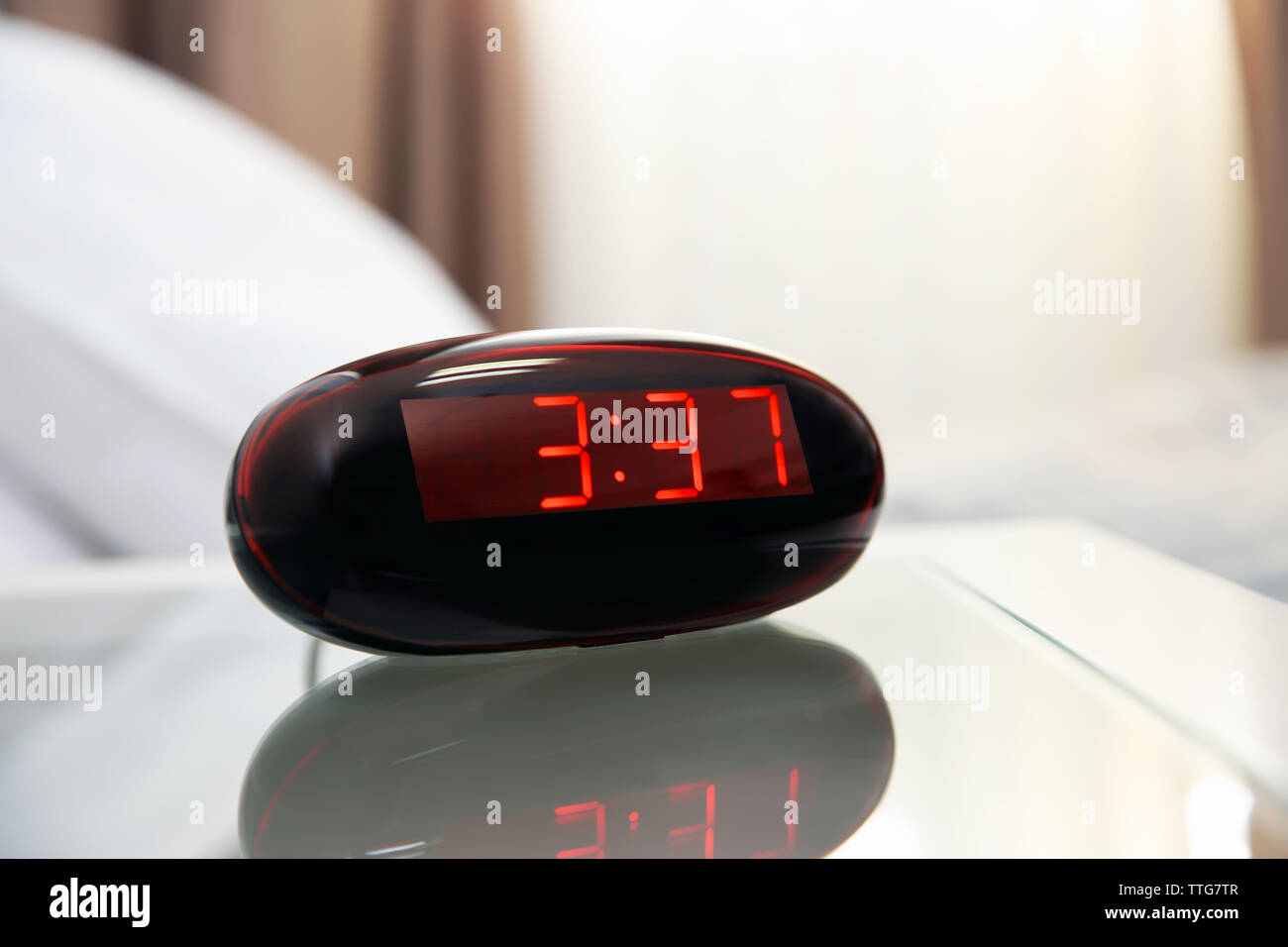 Digital alarm clock by bedside night hi-res stock photography and ...